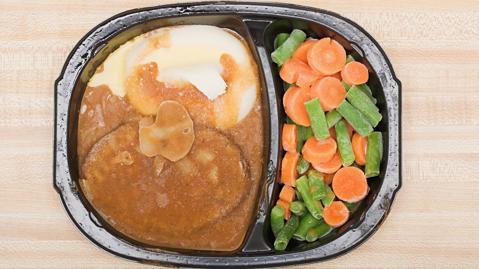13 Expert Tips For Making Frozen Dinners Taste Better