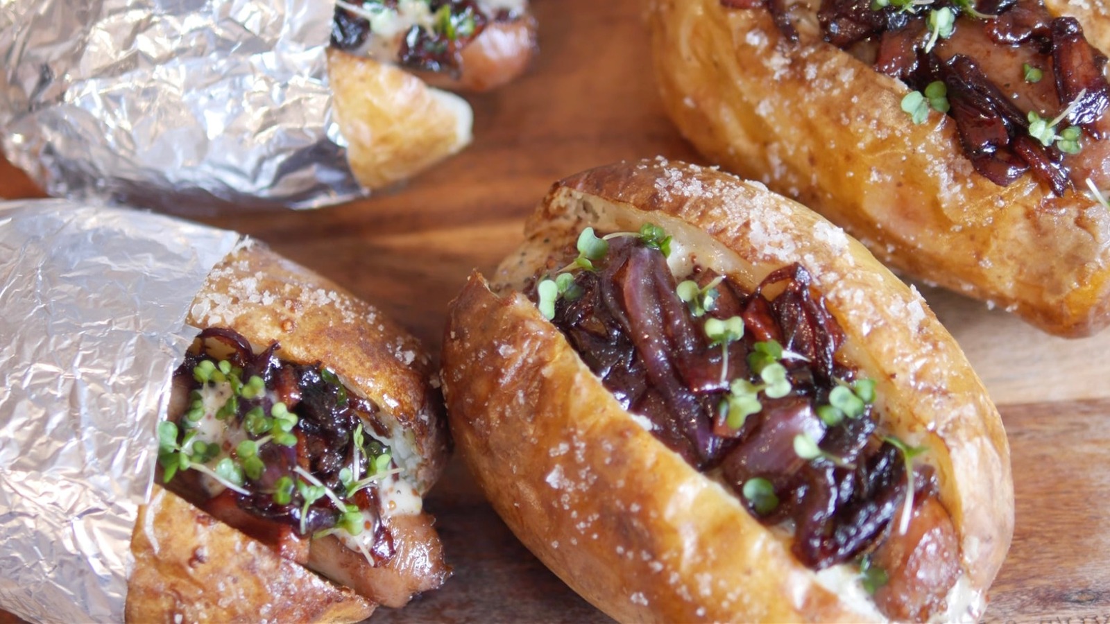 A Loaded Baked Potato Is Honestly The Perfect Vessel For Your Hot Dog