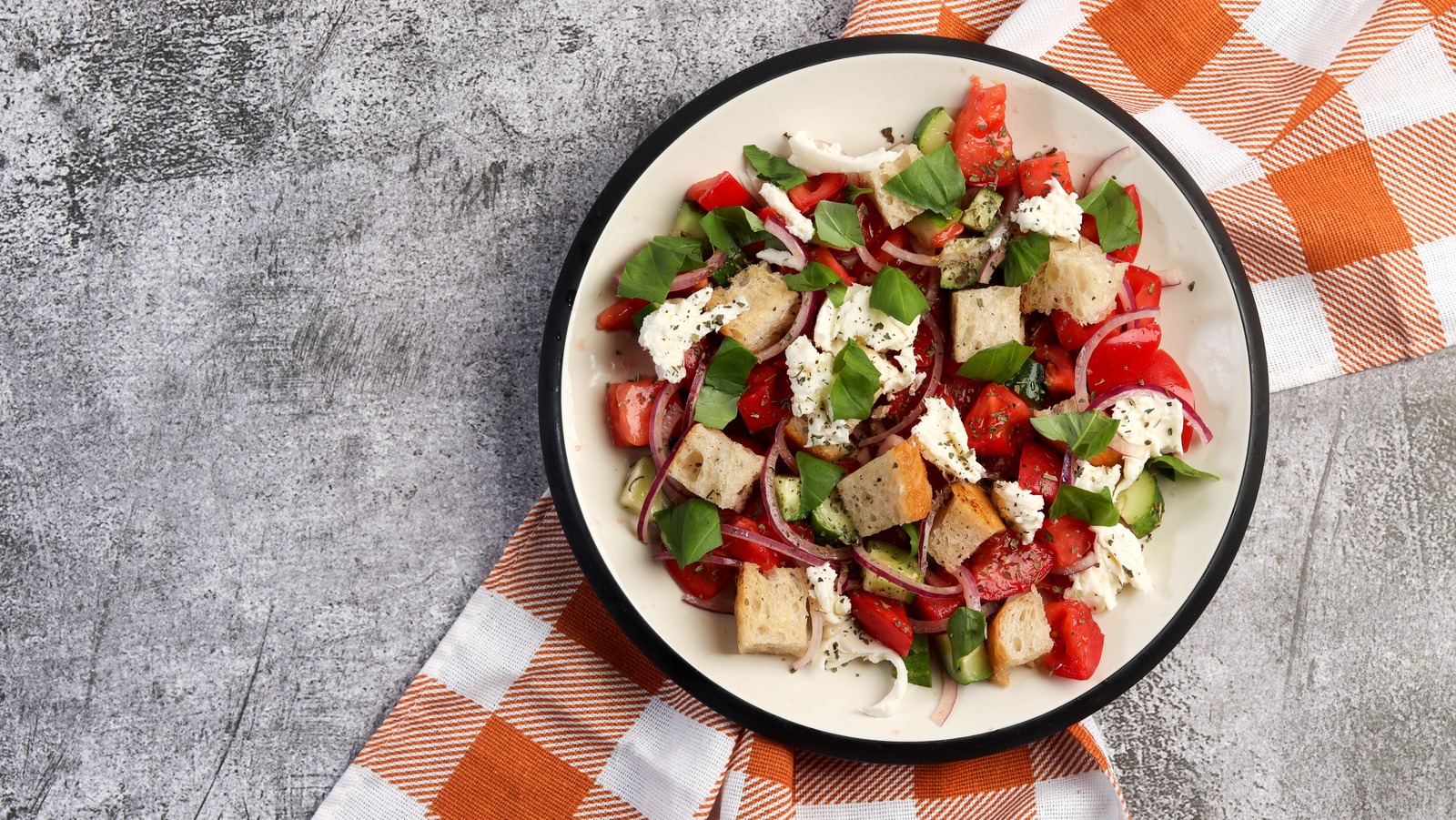 Ancient Rome's Version Of Bread Salad Was Basically A Big Wet Sandwich