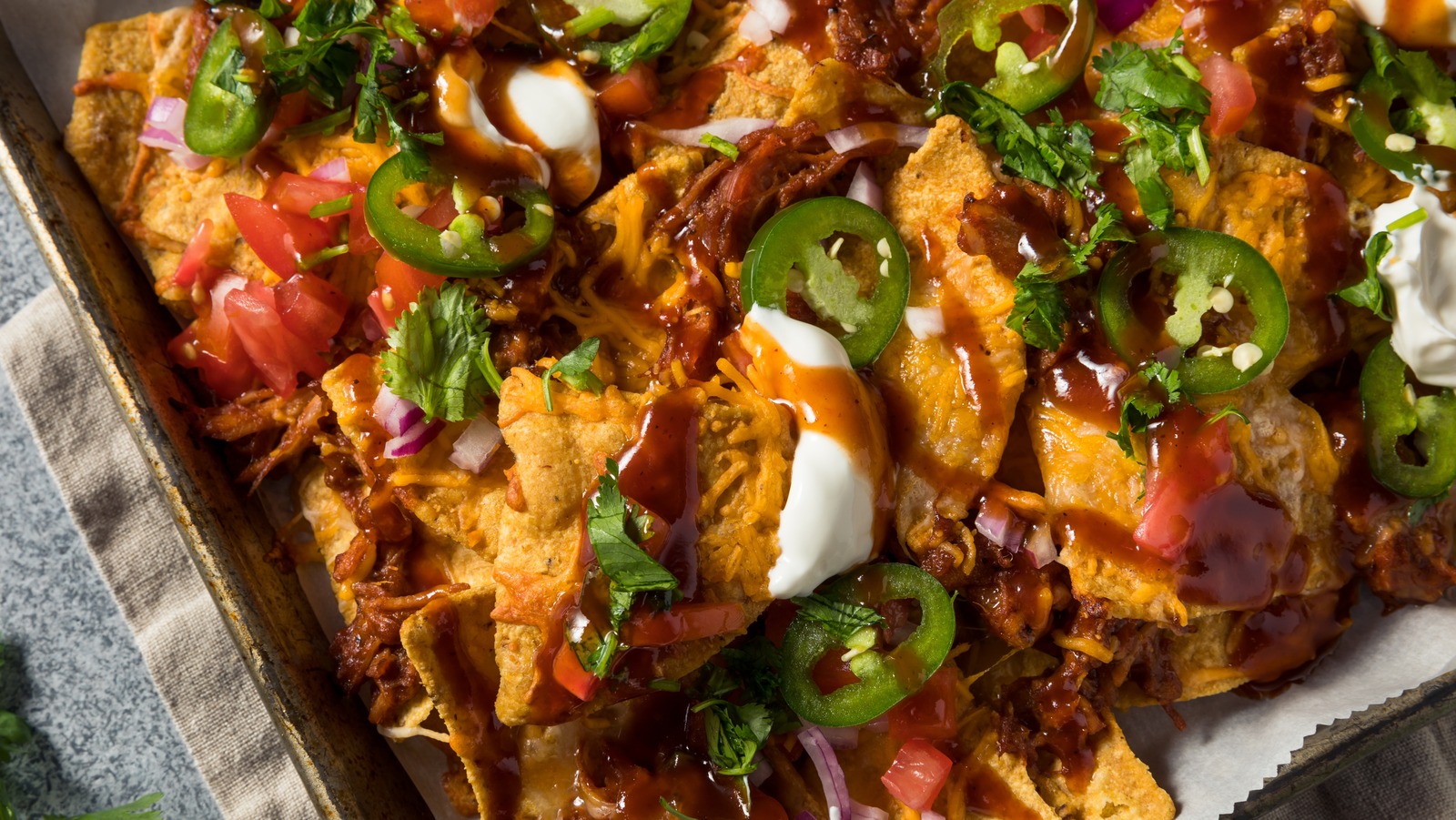 Blow Your Party Guests Away By Serving Up An Entire Table Of Nachos