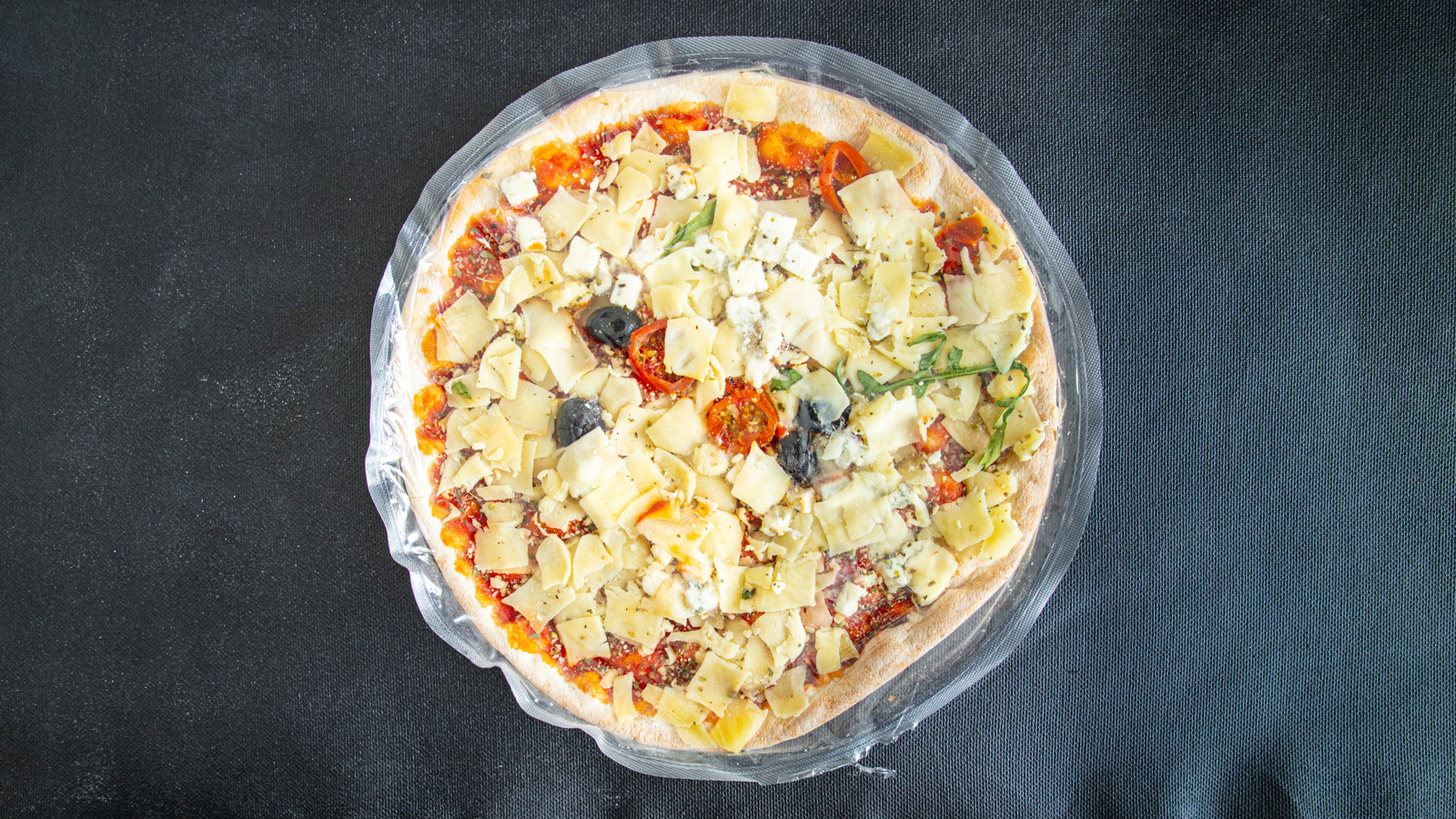 Bulk Up Your Frozen Pizza With This Easy, Meaty Addition