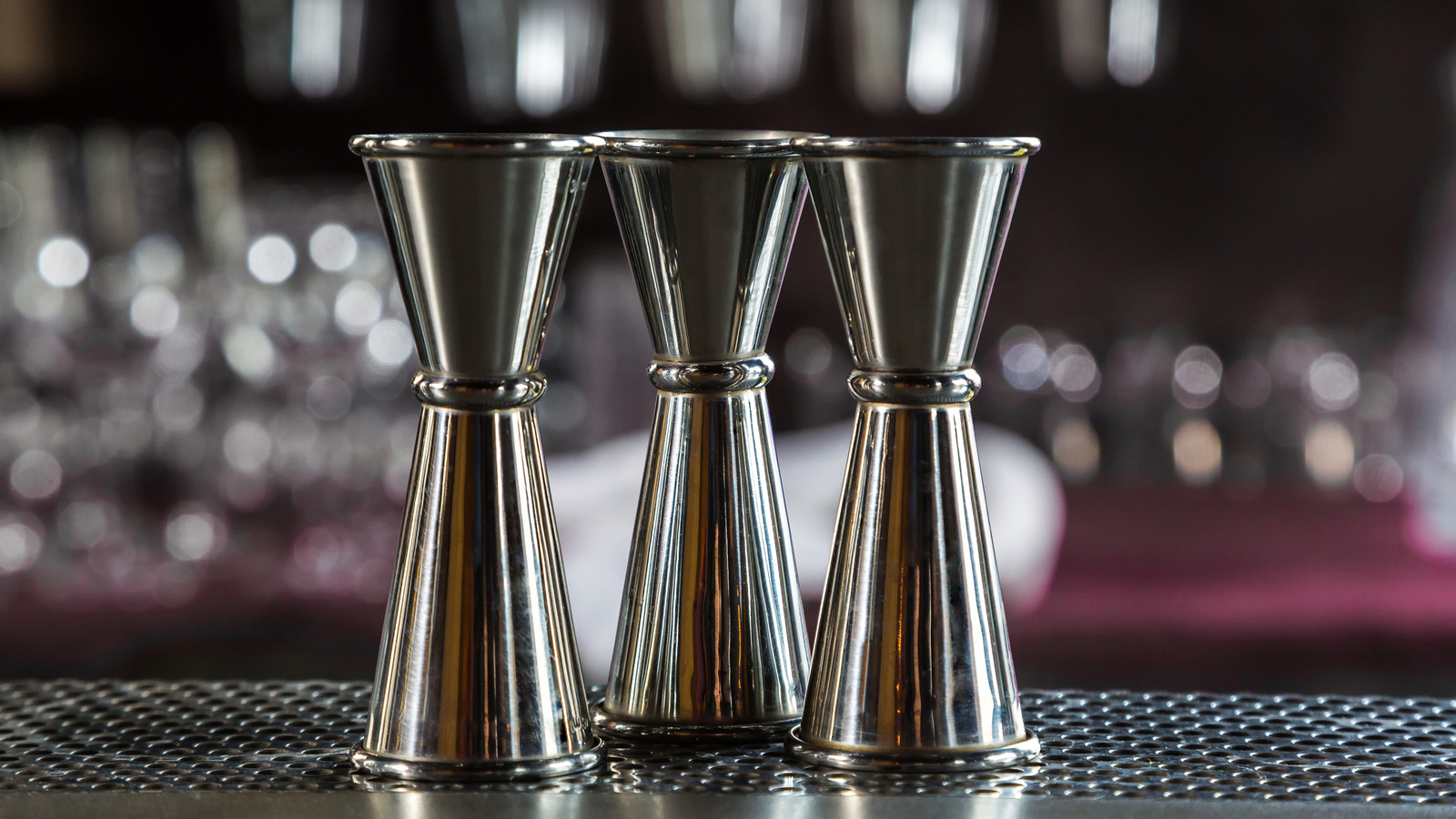 Here's Why Most Cocktail Jiggers Are Hourglass-Shaped