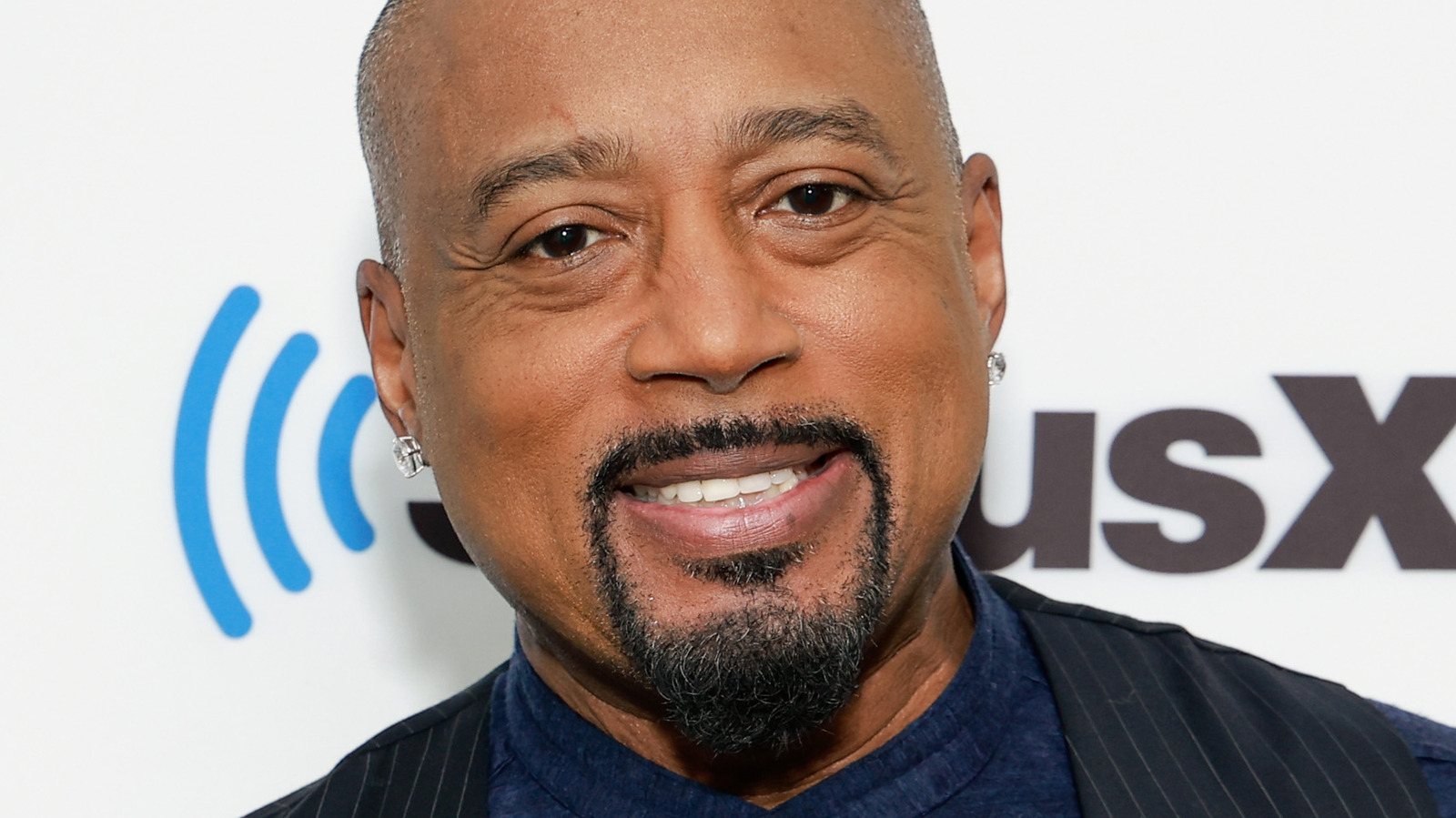 Shark Tank Host Daymond John Seeks Restraining Order Against Bubba's Q
