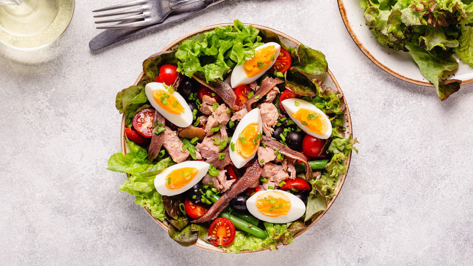 The Contentious Origins Of The Niçoise Salad