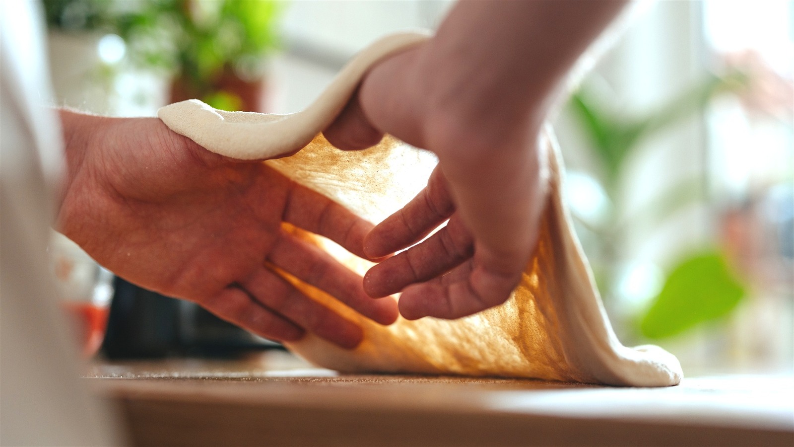 The Secret To Stretching Pizza Dough For Restaurant-Quality Results