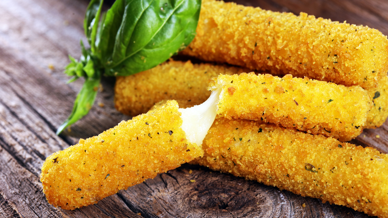 Why You Need To Try Mozzarella Sticks With Melba Sauce