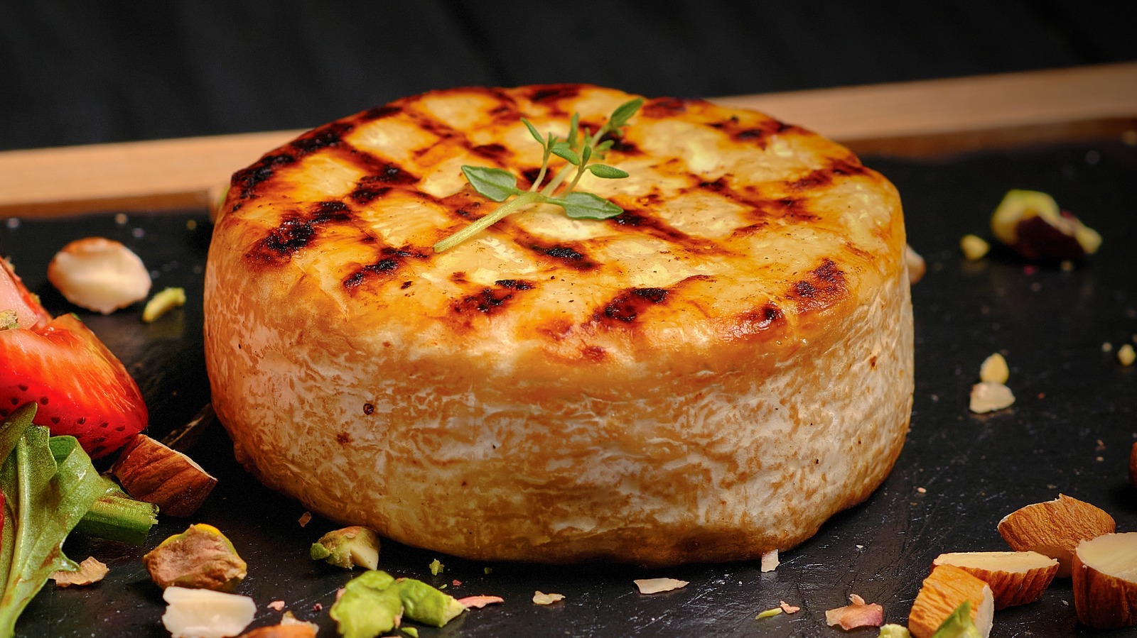 You Should Absolutely Grill An Entire Wheel Of Cheese At Your Next Cookout