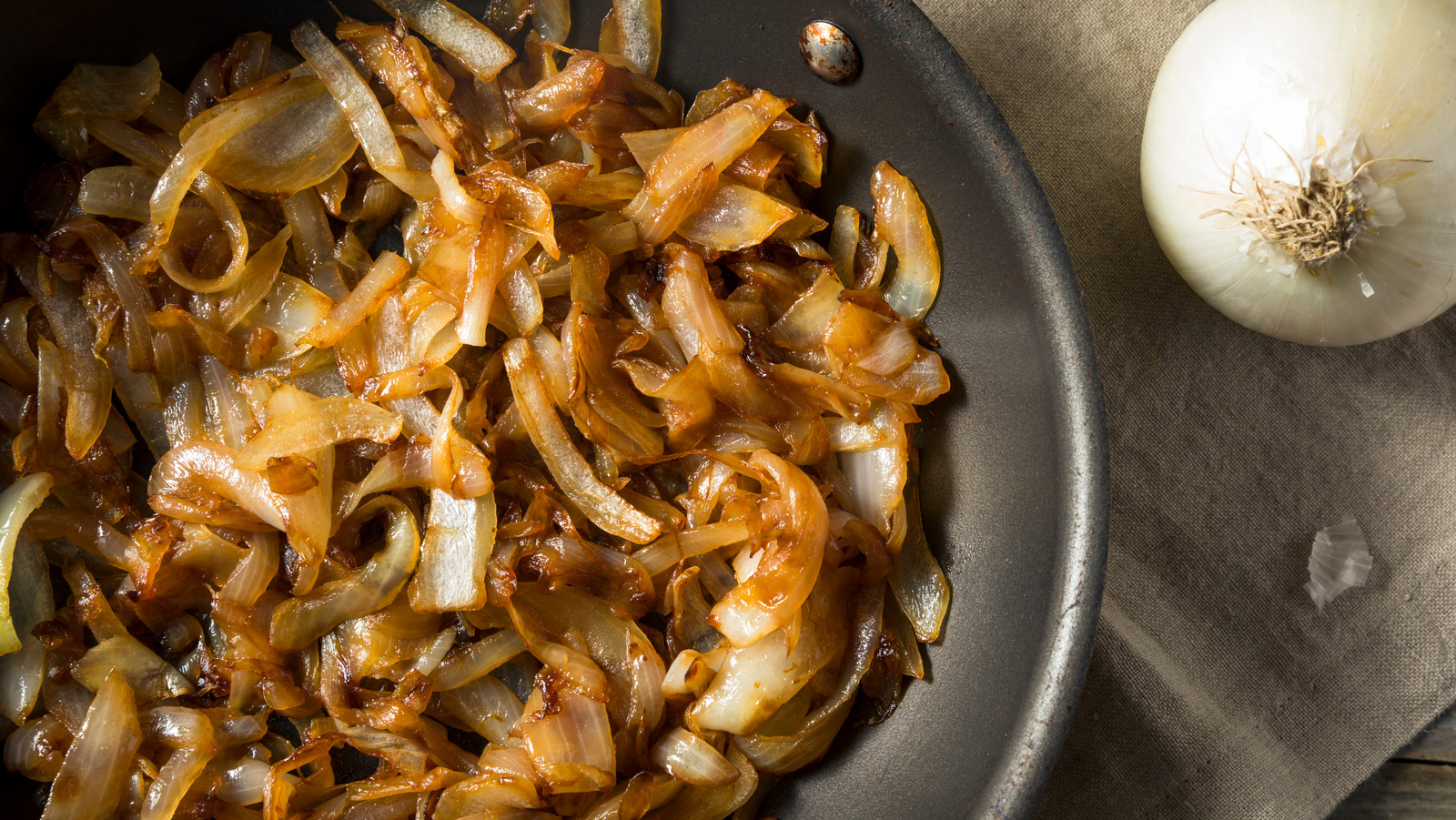 Your Oven Is The Secret Weapon For Caramelizing A Ton Of Onions At Once