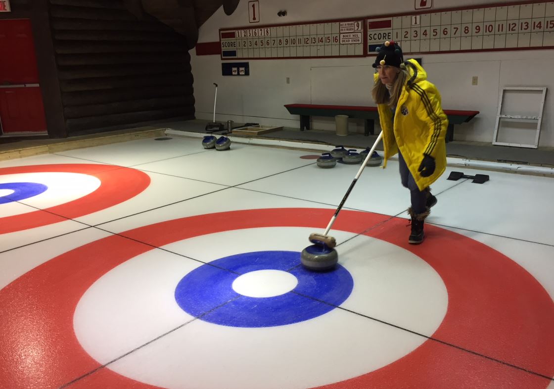 The World's Largest Log Cabin Offers Free Curling Lessons